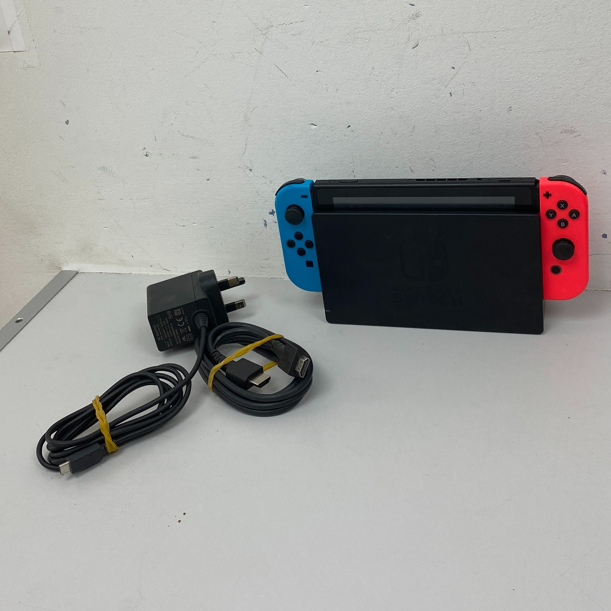 Pre-owned Nintendo Switch Console Neon Blue/ Red Joy-Cons - Own4Less
